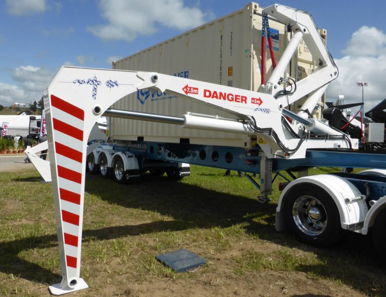 How are containers attached to lorries?