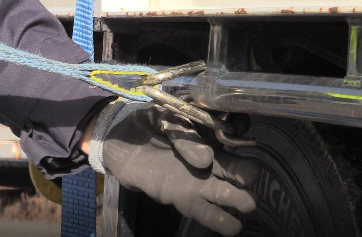 What's a heavy vehicle ratchet tie-down strap?